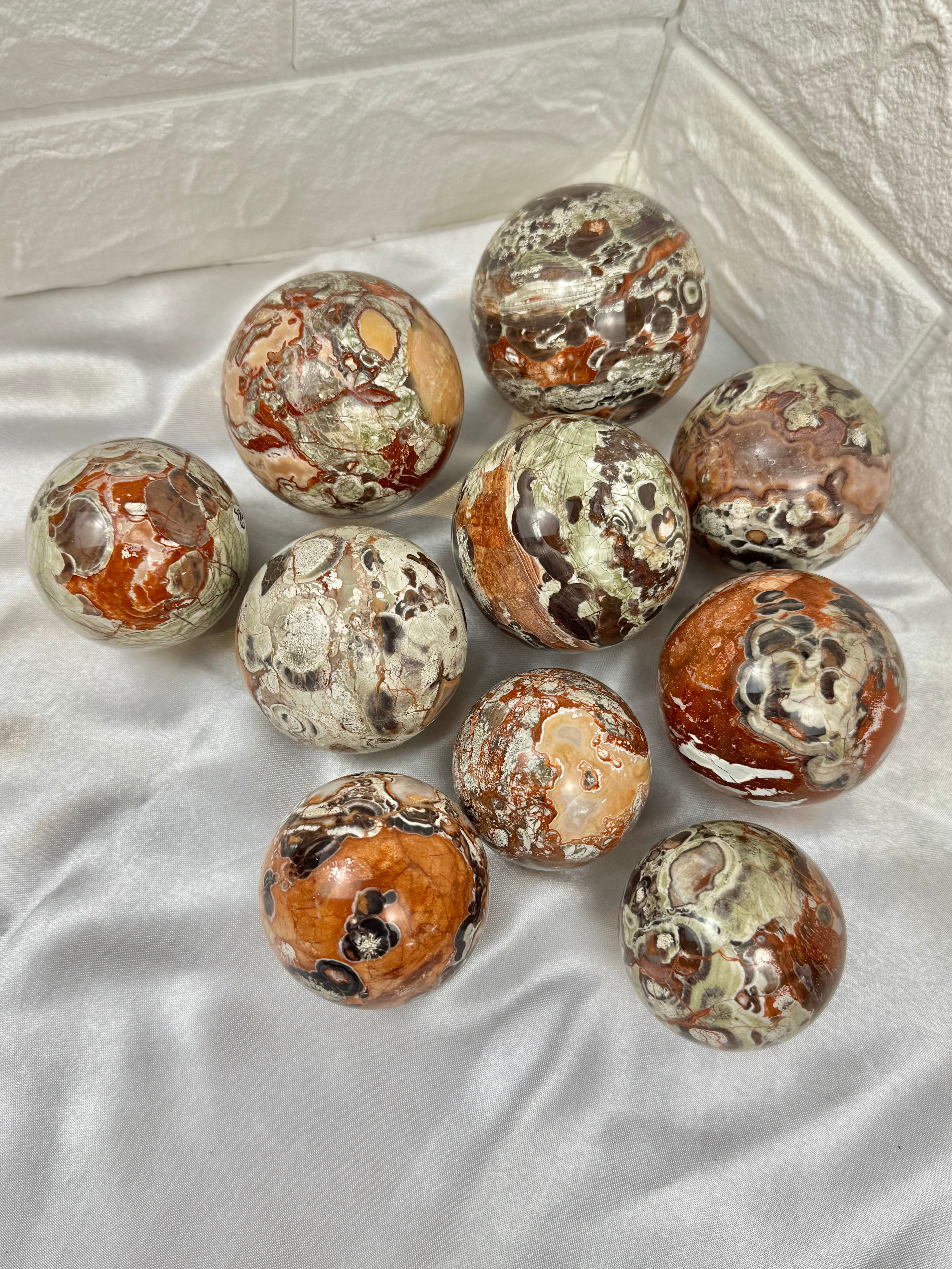 You pick! Money agate spheres from Indonesia – AuraMoonMinerals